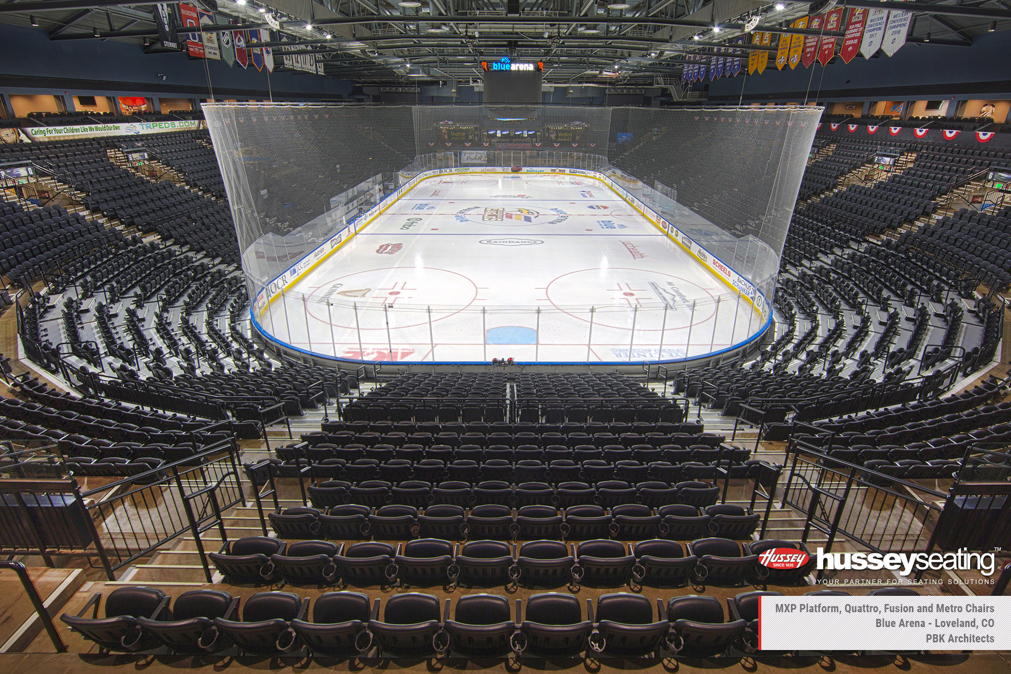 Blue Arena - Fixed Quattro and Fusion chairs - Hussey Seating